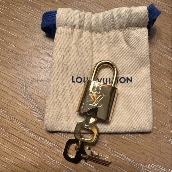 Louis Vuitton | Accessories | Louis Vuitton Shiny Gold Lock And Key Set ...